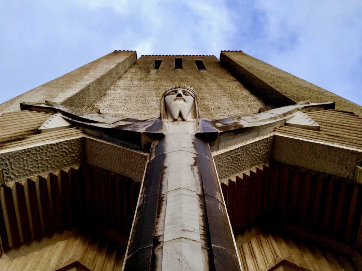 looking up at statue | Roaringwater Journal